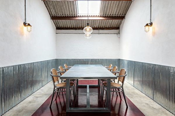 Room AI – Skylit Industrial Dining with Zinc-Topped Table - Interior